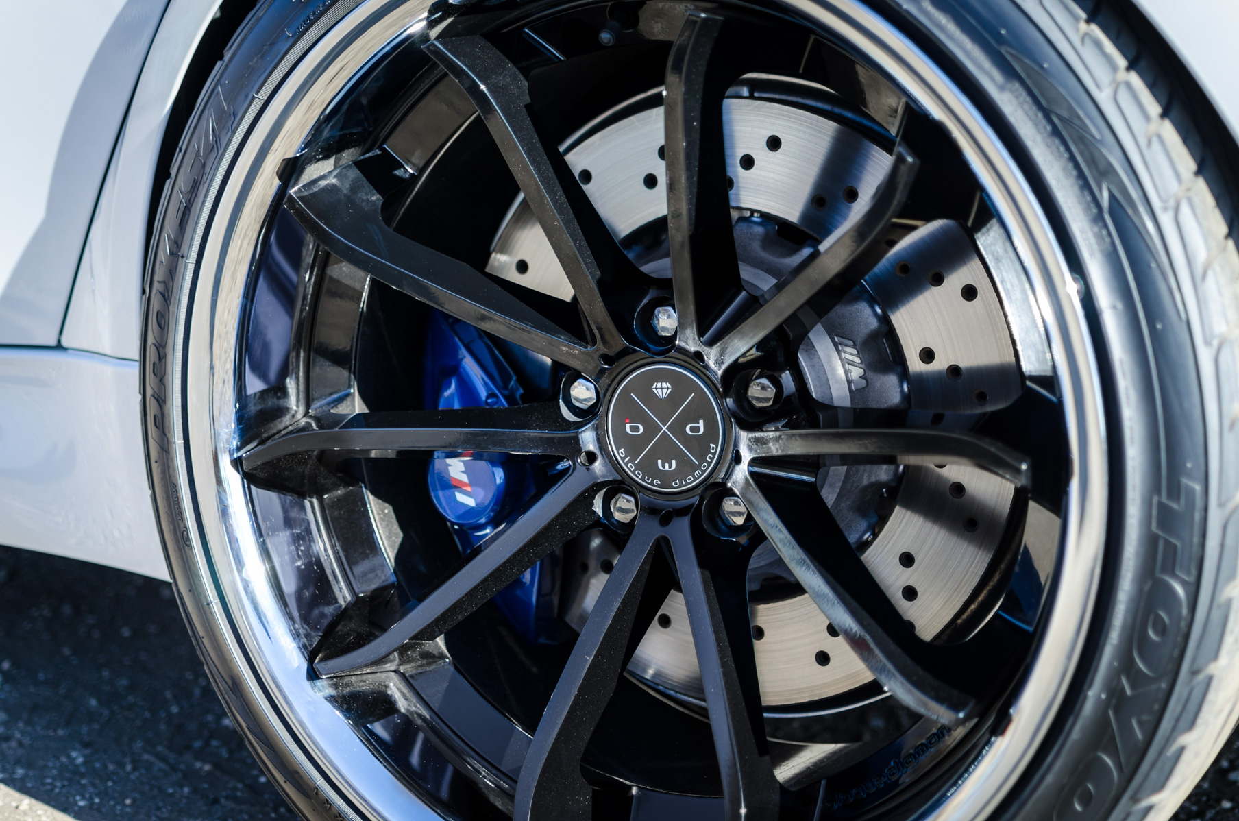 A 2016 BMW M3 on 20 Inch Blaque Diamond BD-23 Black with SS Lip Wheels ...