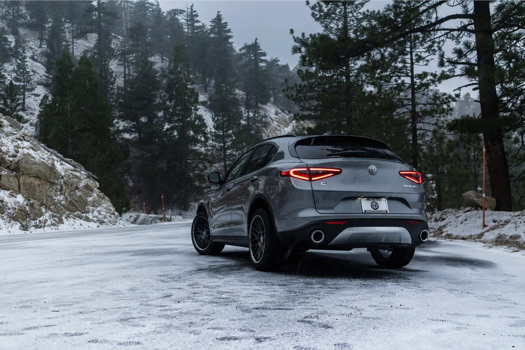 An Alfa Romeo Stelvio on Blaque Diamond BD-27 Matte Black with Black ...